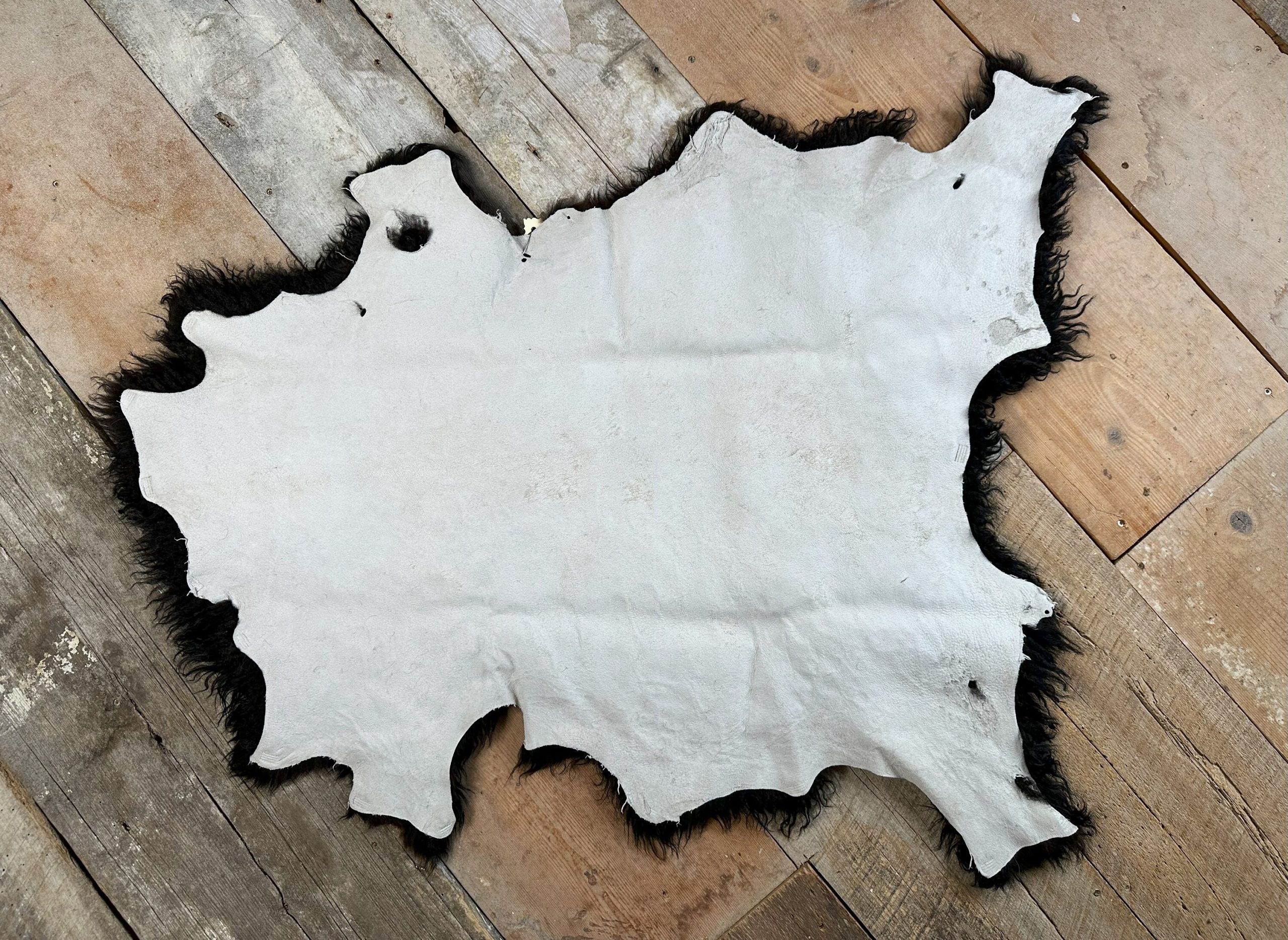 All Natural Lustrous Coal Black sheepskin w/ waves - Telderer's ...