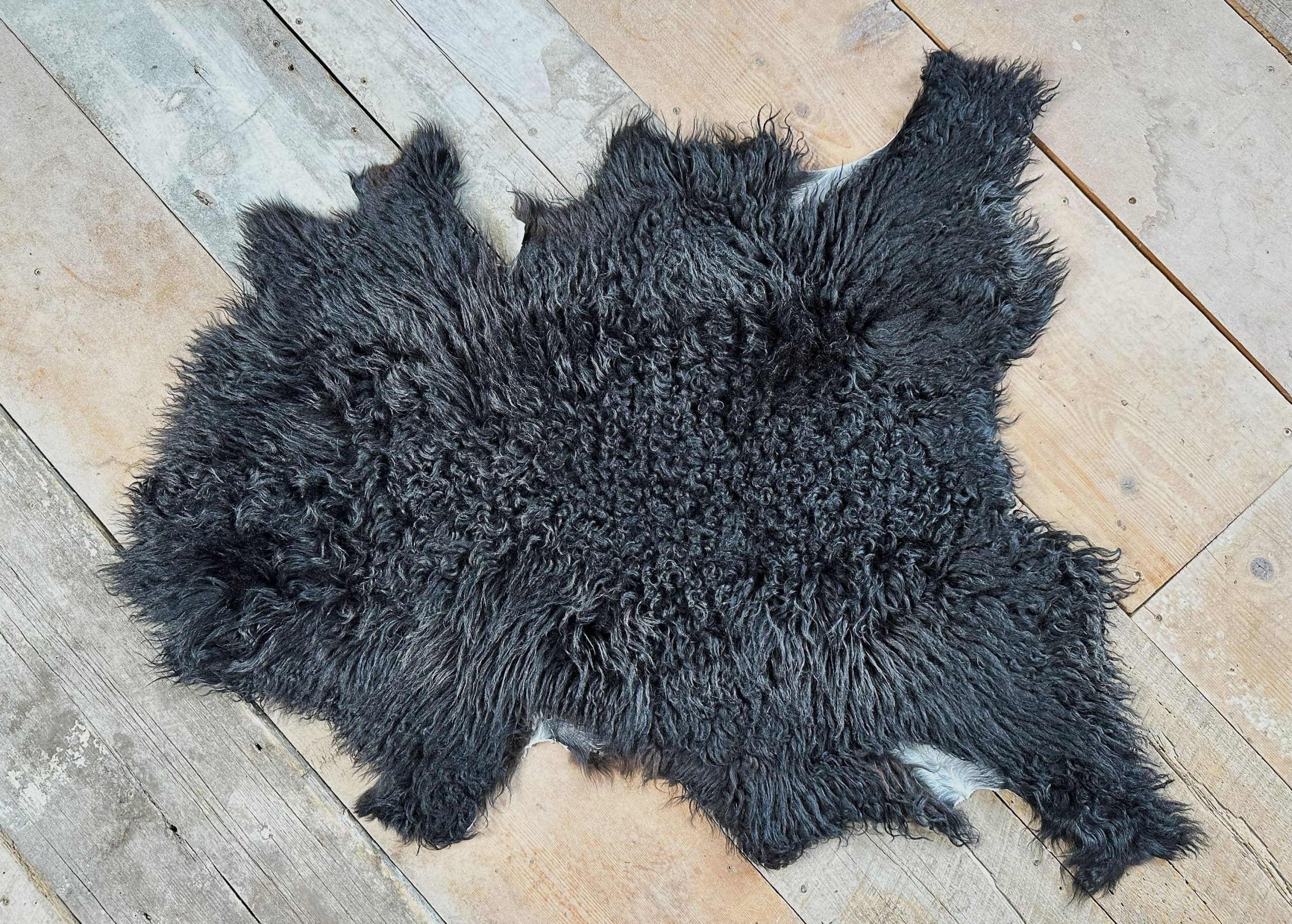 All Natural Lustrous Coal Black sheepskin w/ waves - Telderer's ...